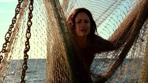 Woman trapped in a fishing nets
