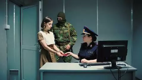 Police interrogation scene. A room with a desk i