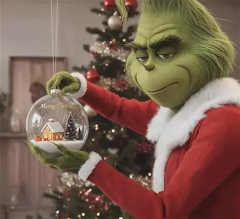 "A full-body image of the Grinch standing triump
